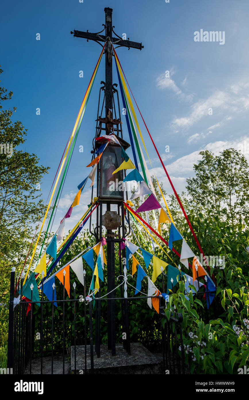 Small Catholic shrine with a cross in small village in Mazovia region ...