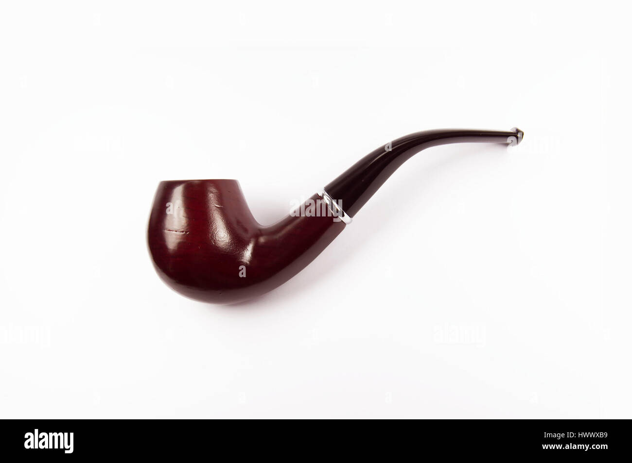 red wooden pipe on white background Stock Photo - Alamy