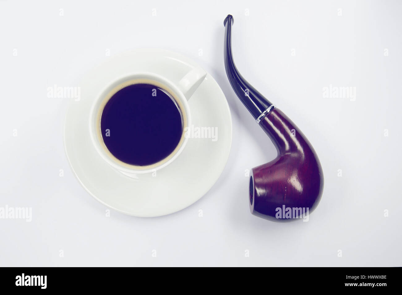 red wooden pipe and cup of coffee on white background Stock Photo - Alamy