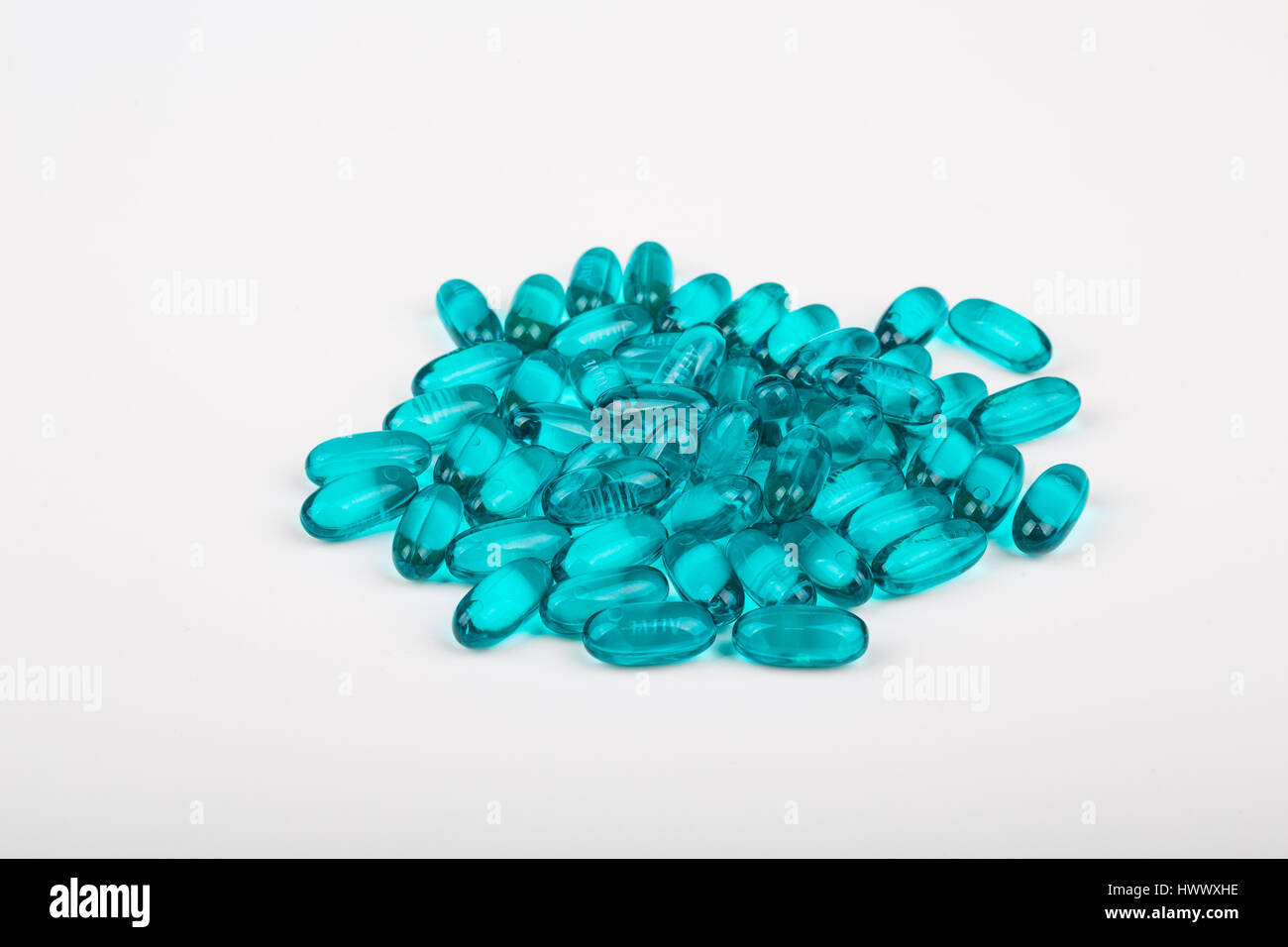Blue Gel Capsules on White Background Stock Photo - Alamy