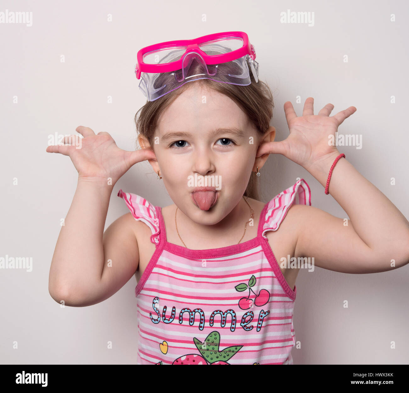 Girl in a pink mask hi-res stock photography and images - Alamy