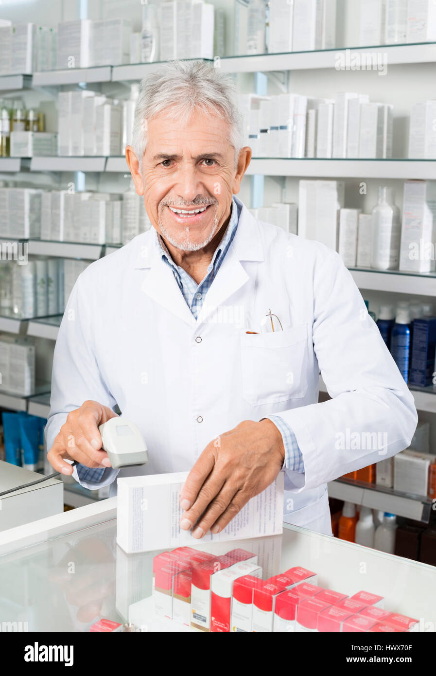 Pharmacist scanning medication scanner hi-res stock photography and ...