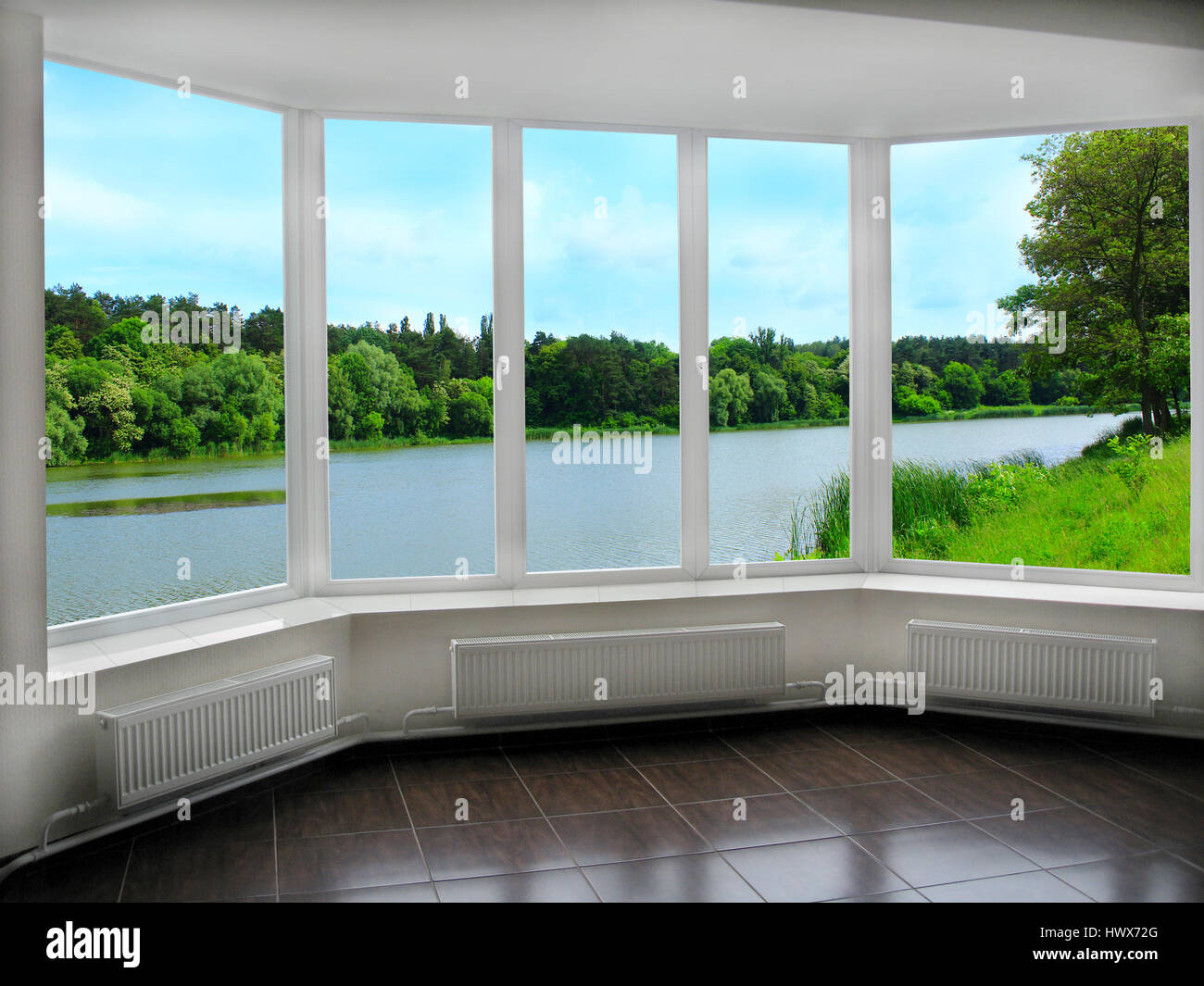 office panoramic windows with view to the beautiful forest river Stock ...