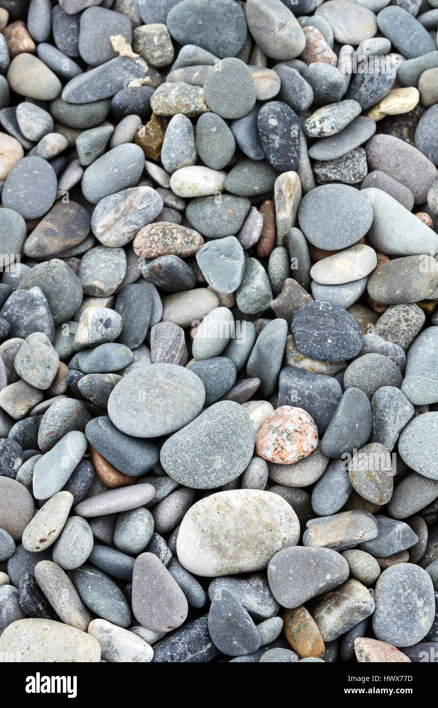 Rounded grey granite rocks beach hi-res stock photography and images ...