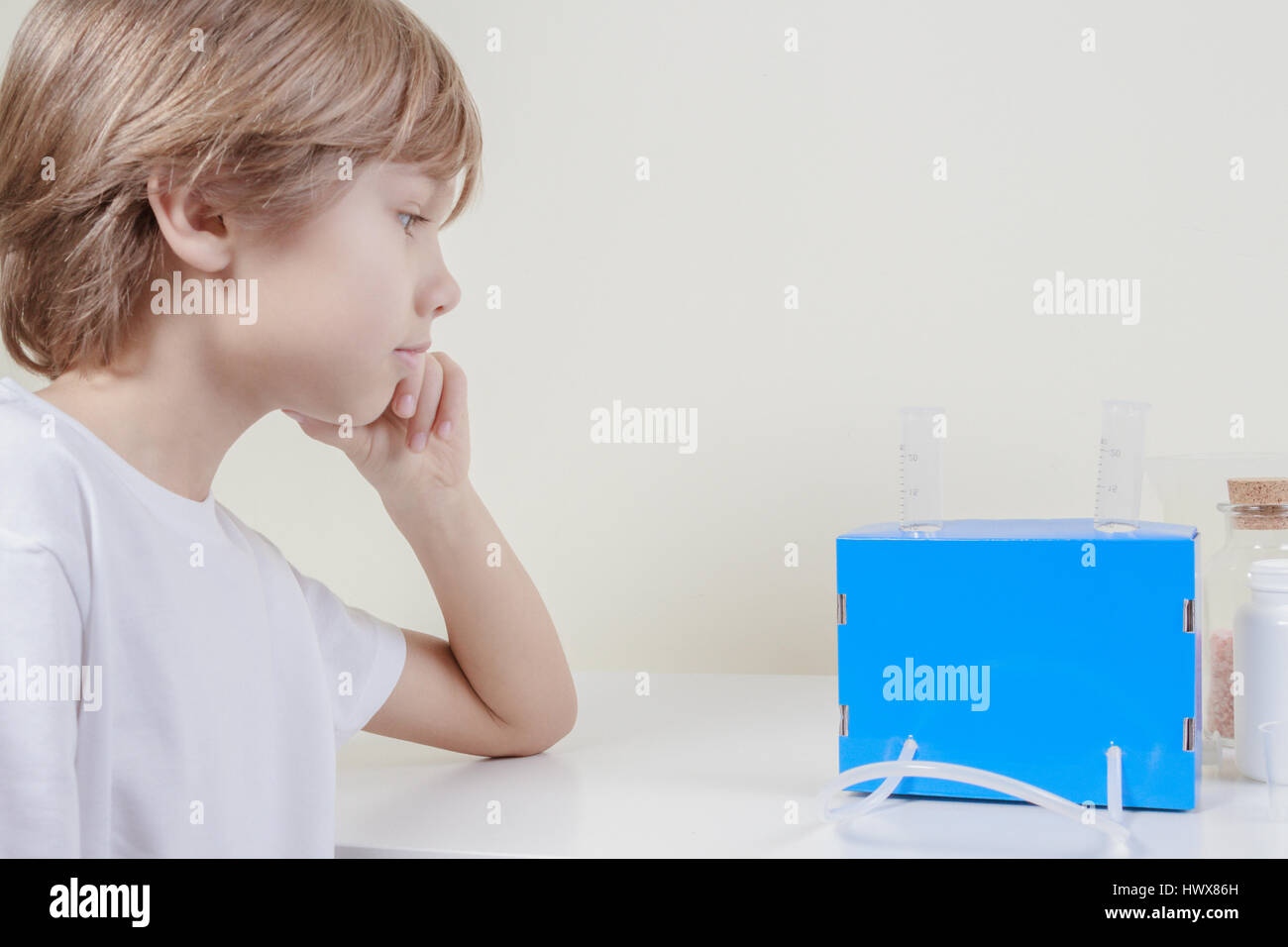 Young boy making science experiments. Education concept Stock Photo - Alamy