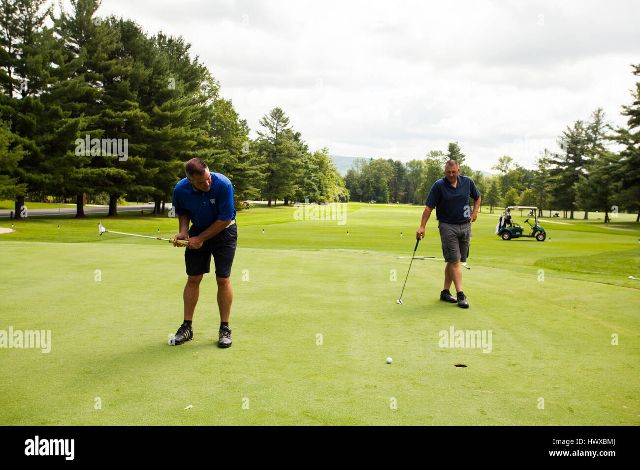 Golf club swinging playing golf hi-res stock photography and images - Alamy