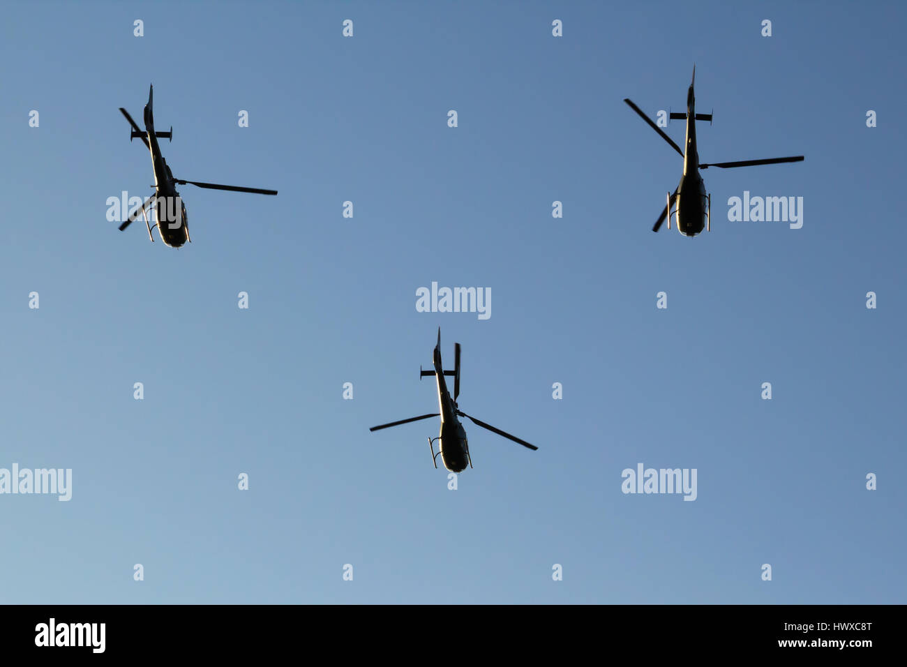 Three Serbian Air Force Helicopters flying in formation on parade in ...