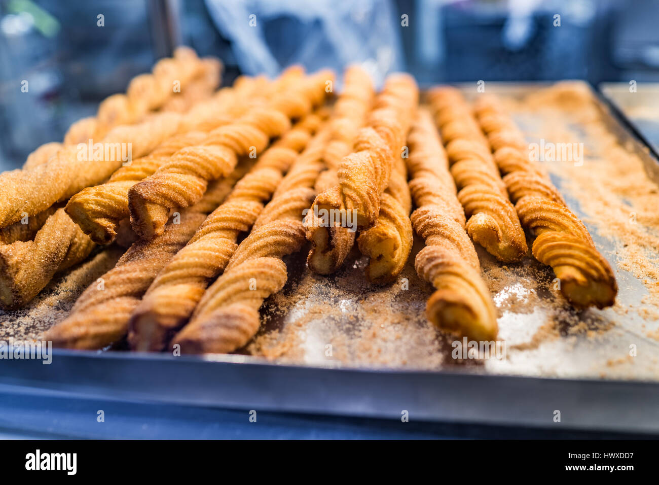 Many long churros on display showing texture closeup Stock Photo - Alamy