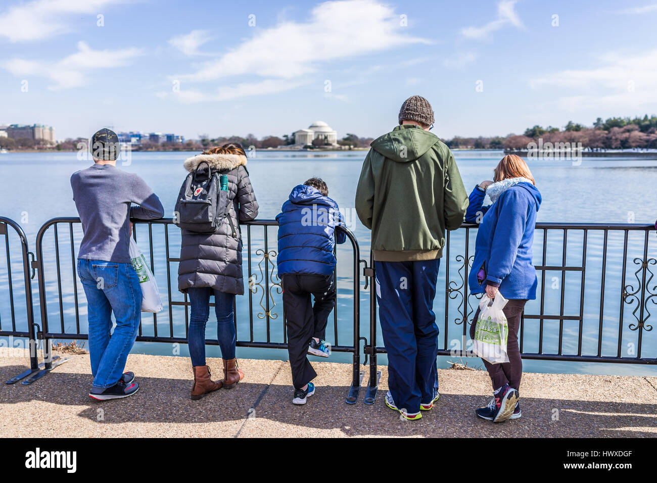 Leaning over rail hi-res stock photography and images - Alamy