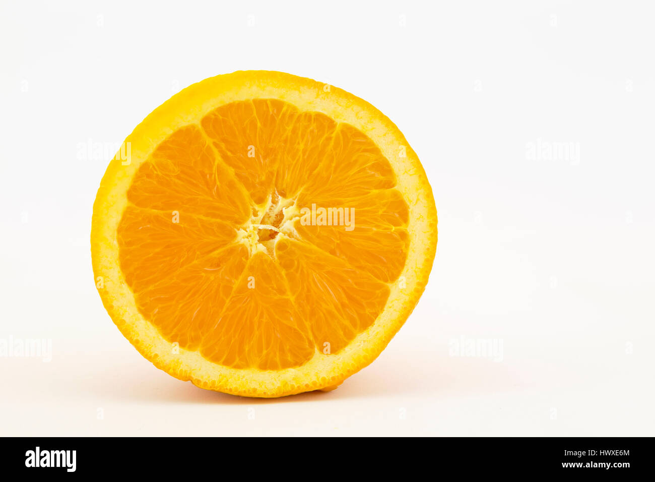 Citrus sliced in half on white background Stock Photo - Alamy