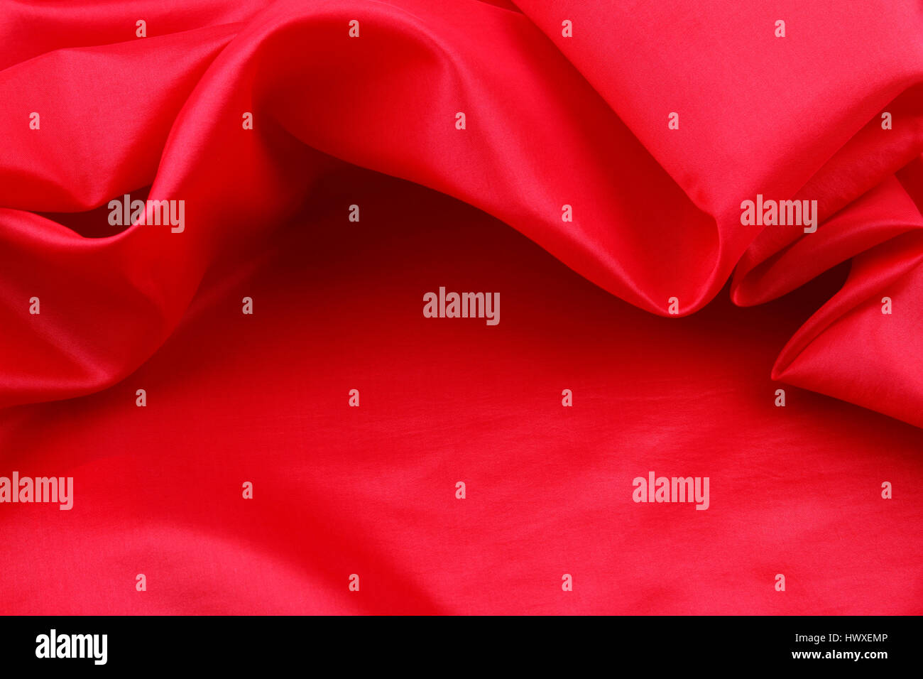 Closeup of ripples in red silk fabric Stock Photo - Alamy