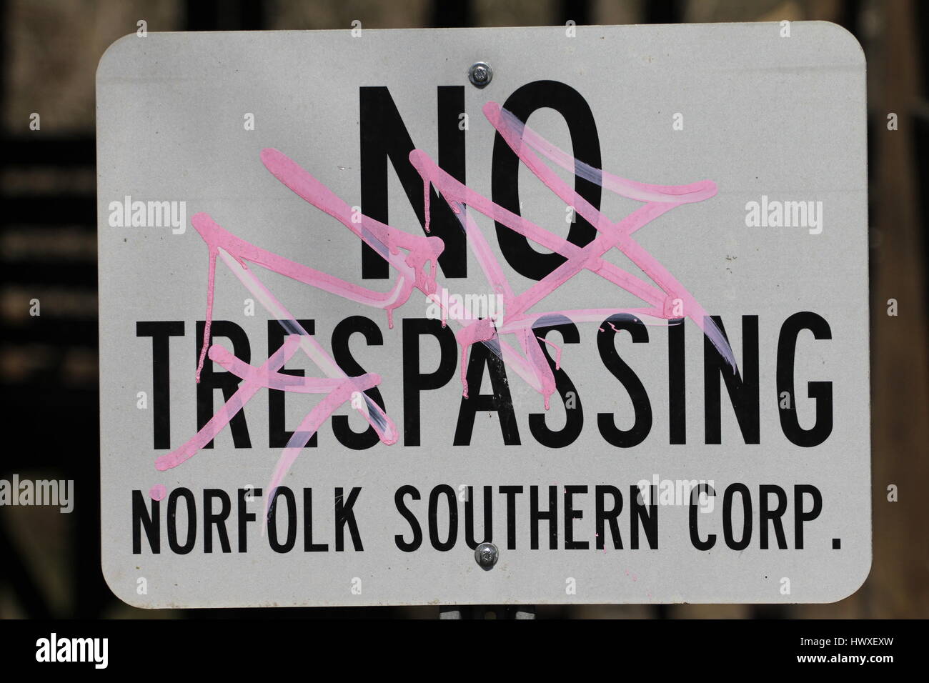 Vandalized No Trespassing Sign Stock Photo - Alamy