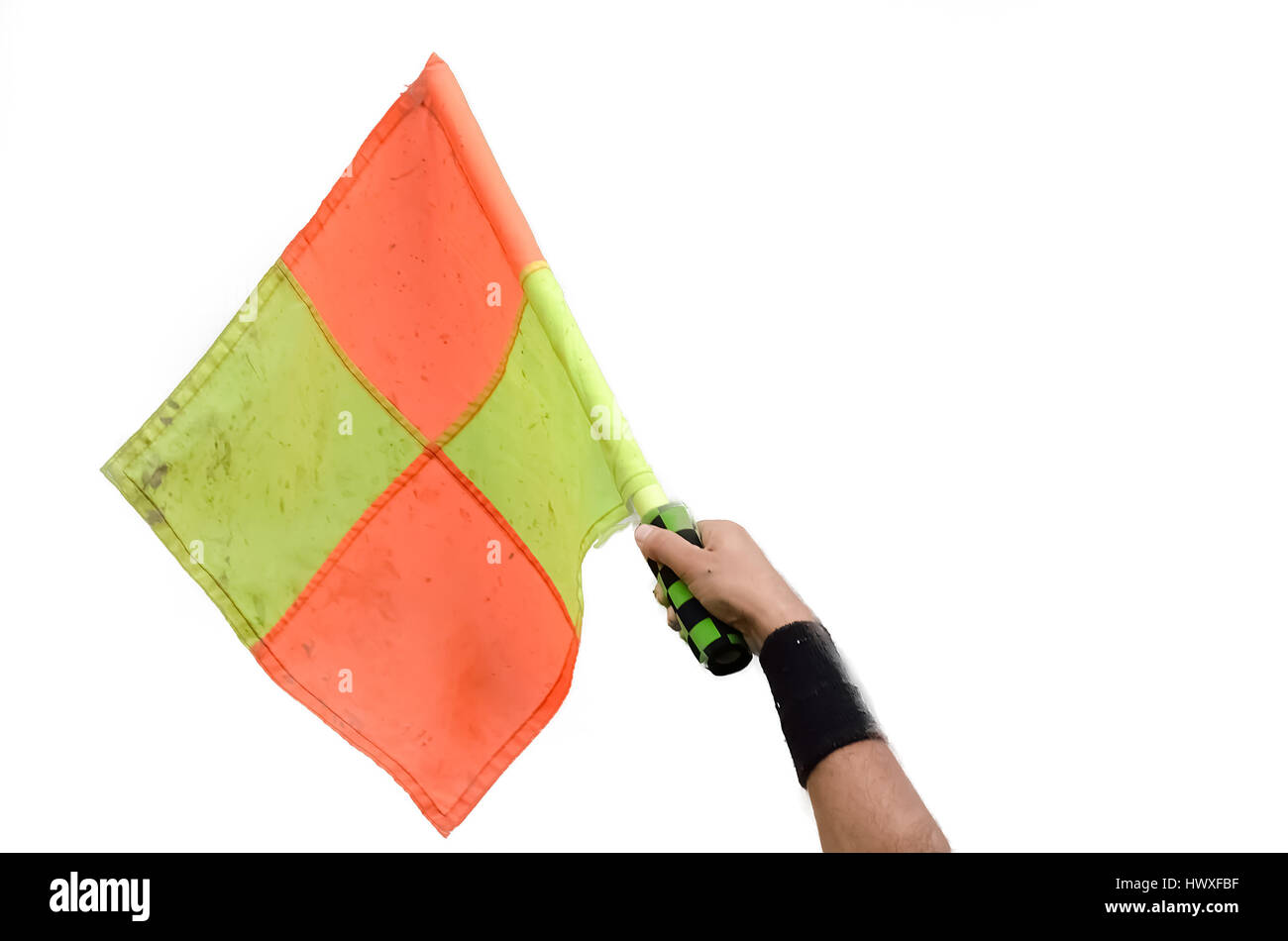 Soccer assistant referee showing offside Stock Photo - Alamy