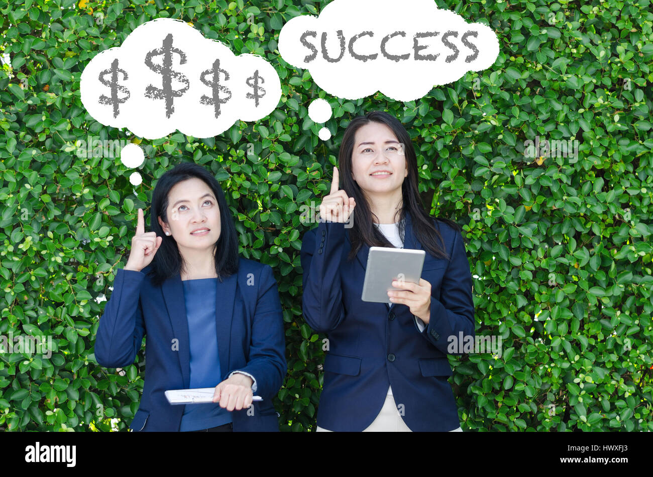Leader business women concept. Two business women looking up and ...