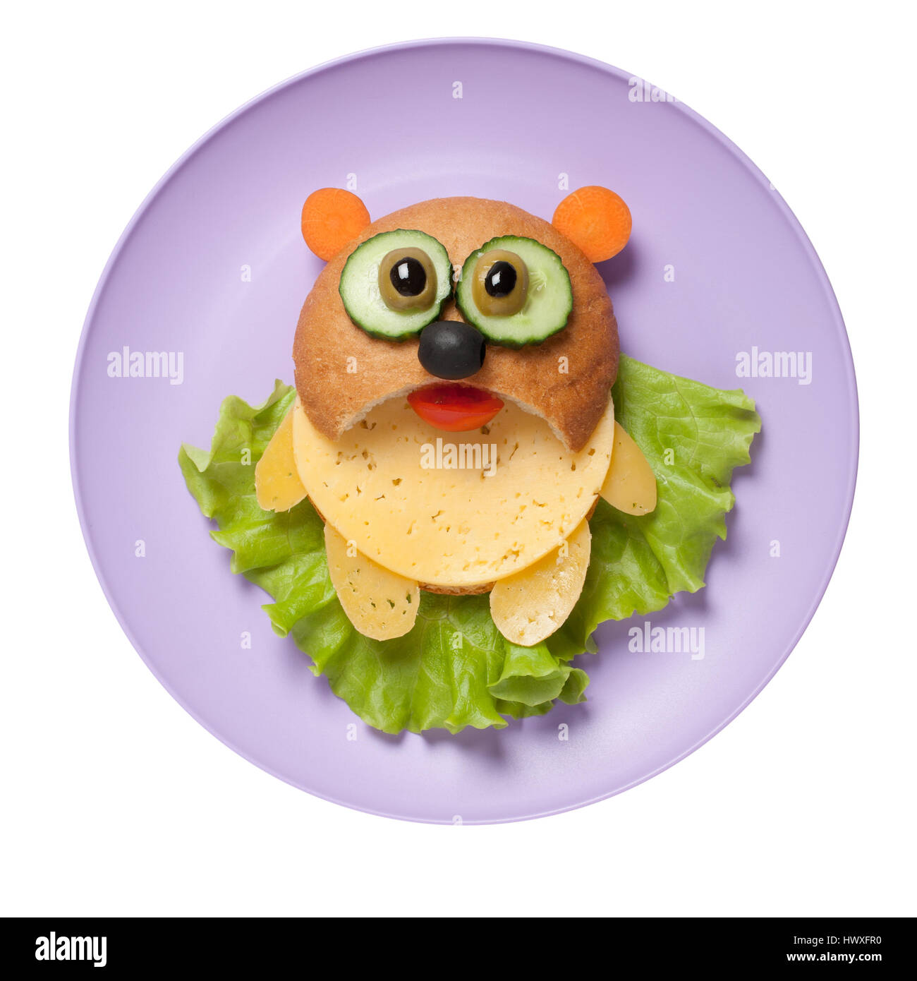Panda created from bread, cheese and vegetables on plate Stock Photo ...