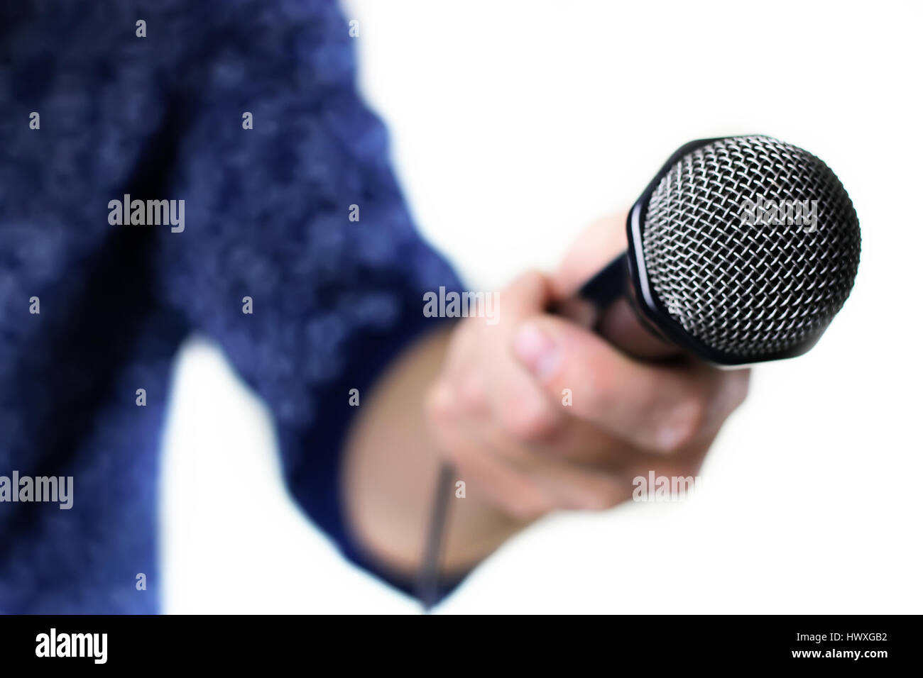 Asian reporter holding microphone hi-res stock photography and images ...
