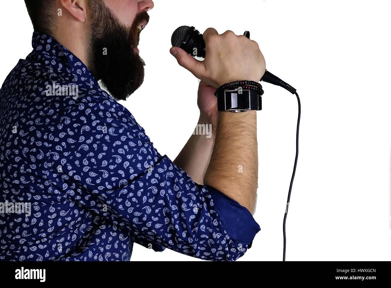 microphone on stage hand hold Stock Photo - Alamy