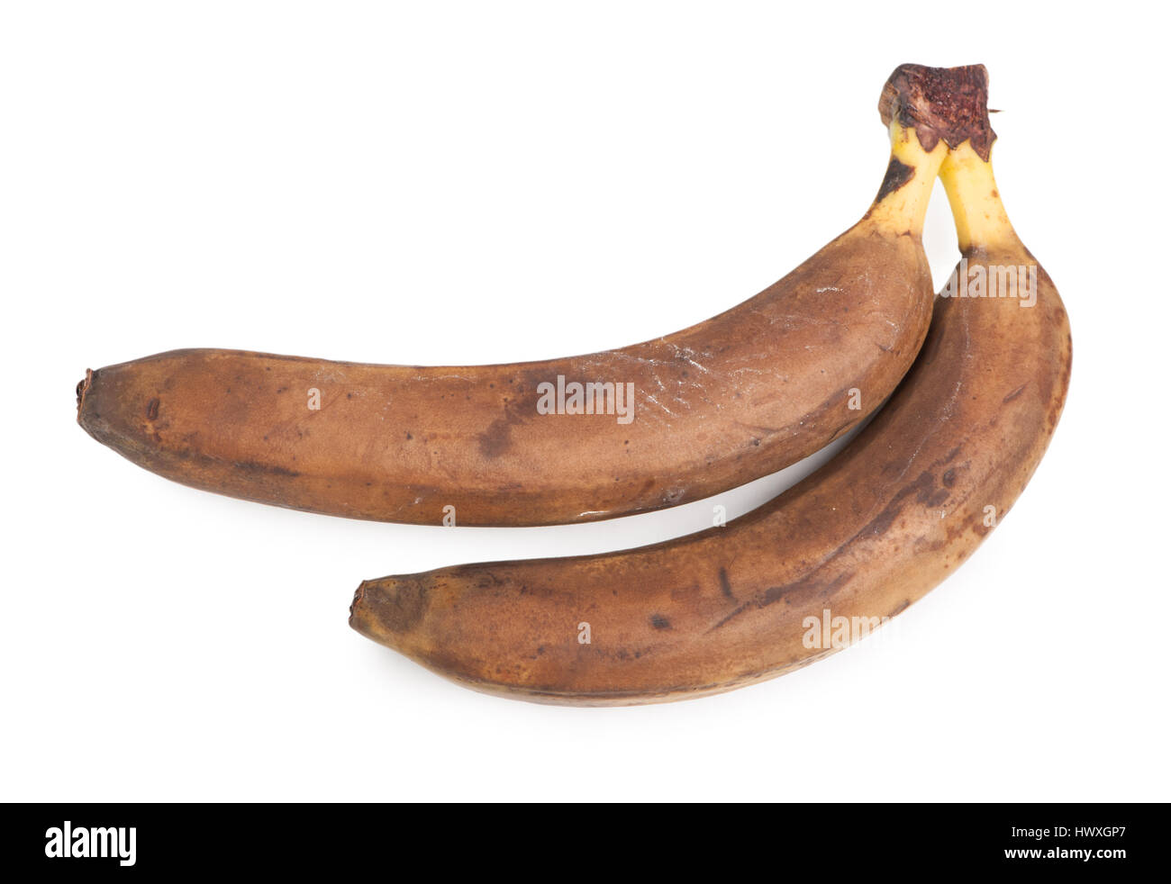 Old banana isolated on white background Stock Photo - Alamy