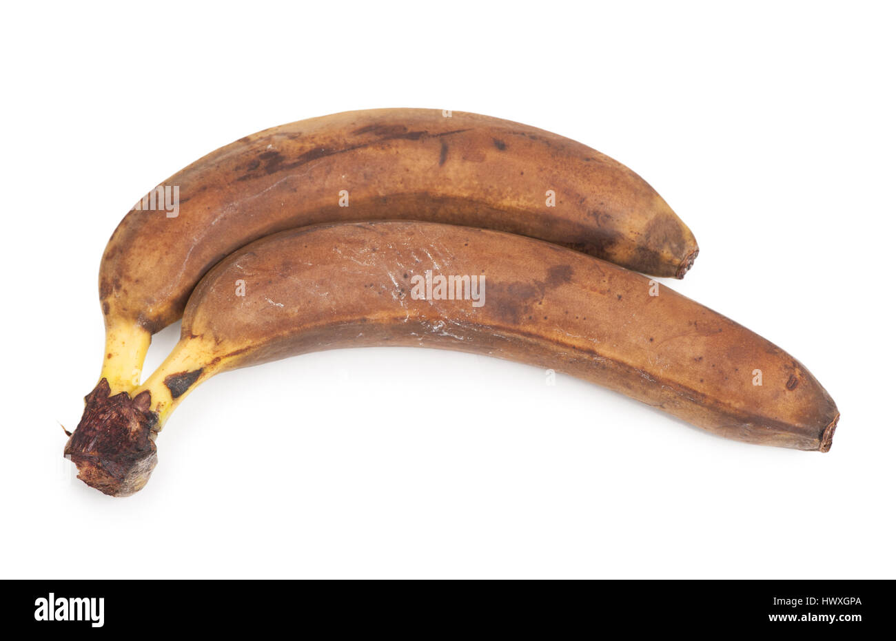 Old banana isolated on white background Stock Photo - Alamy