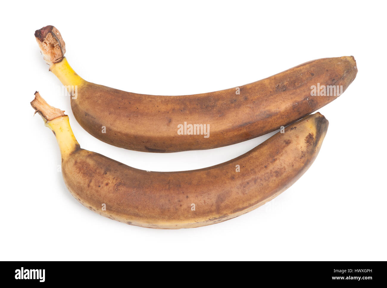 Old banana isolated on white background Stock Photo - Alamy