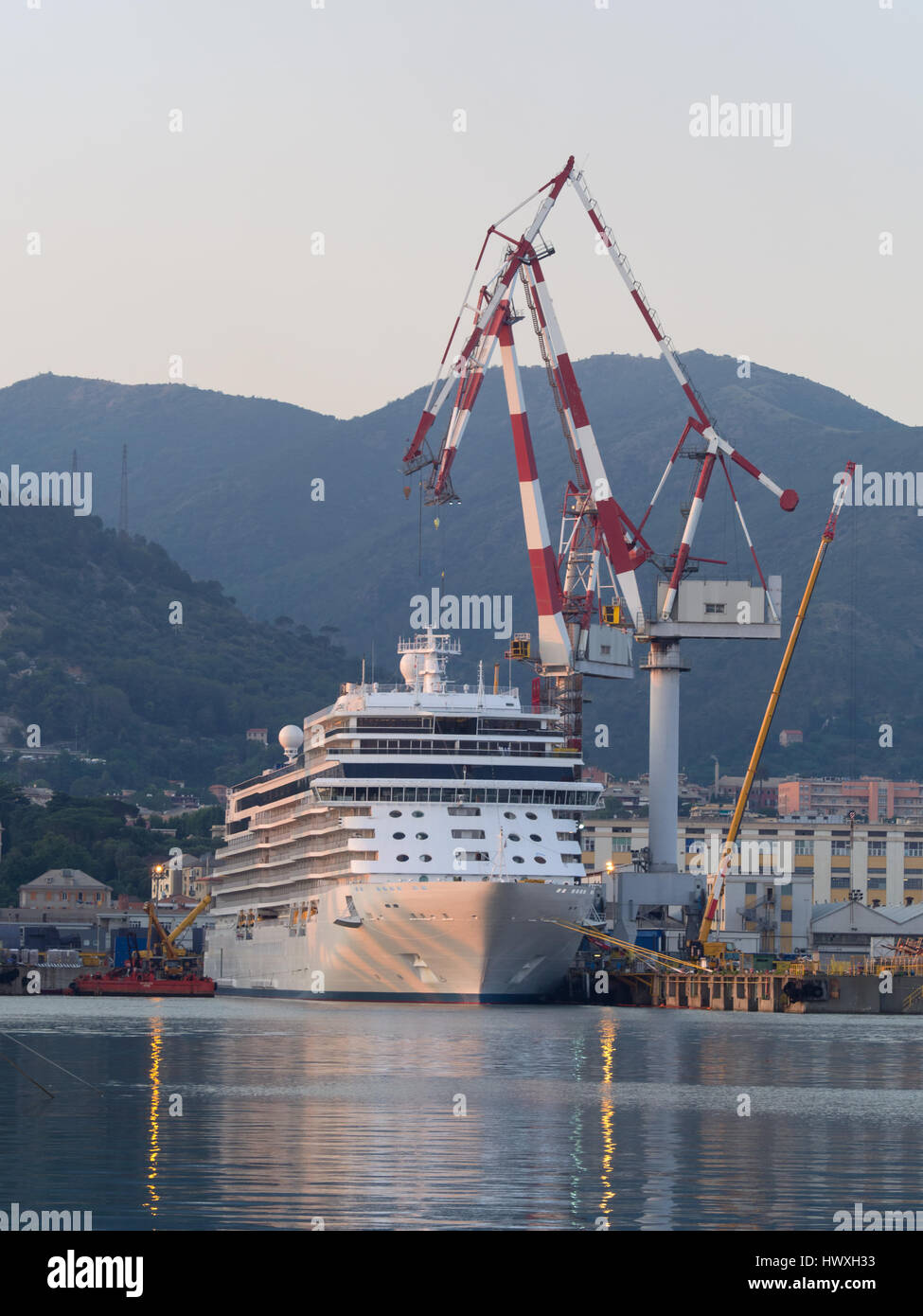 Genoa, Italy july 01, 2016: Cruise ship moored at a dock of a shipyard ...