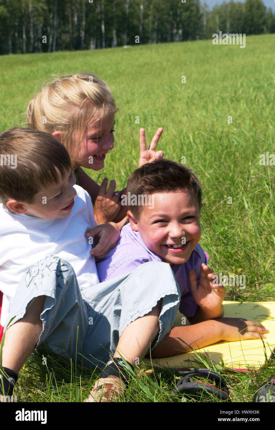 Three kids joke not adult hi-res stock photography and images - Alamy