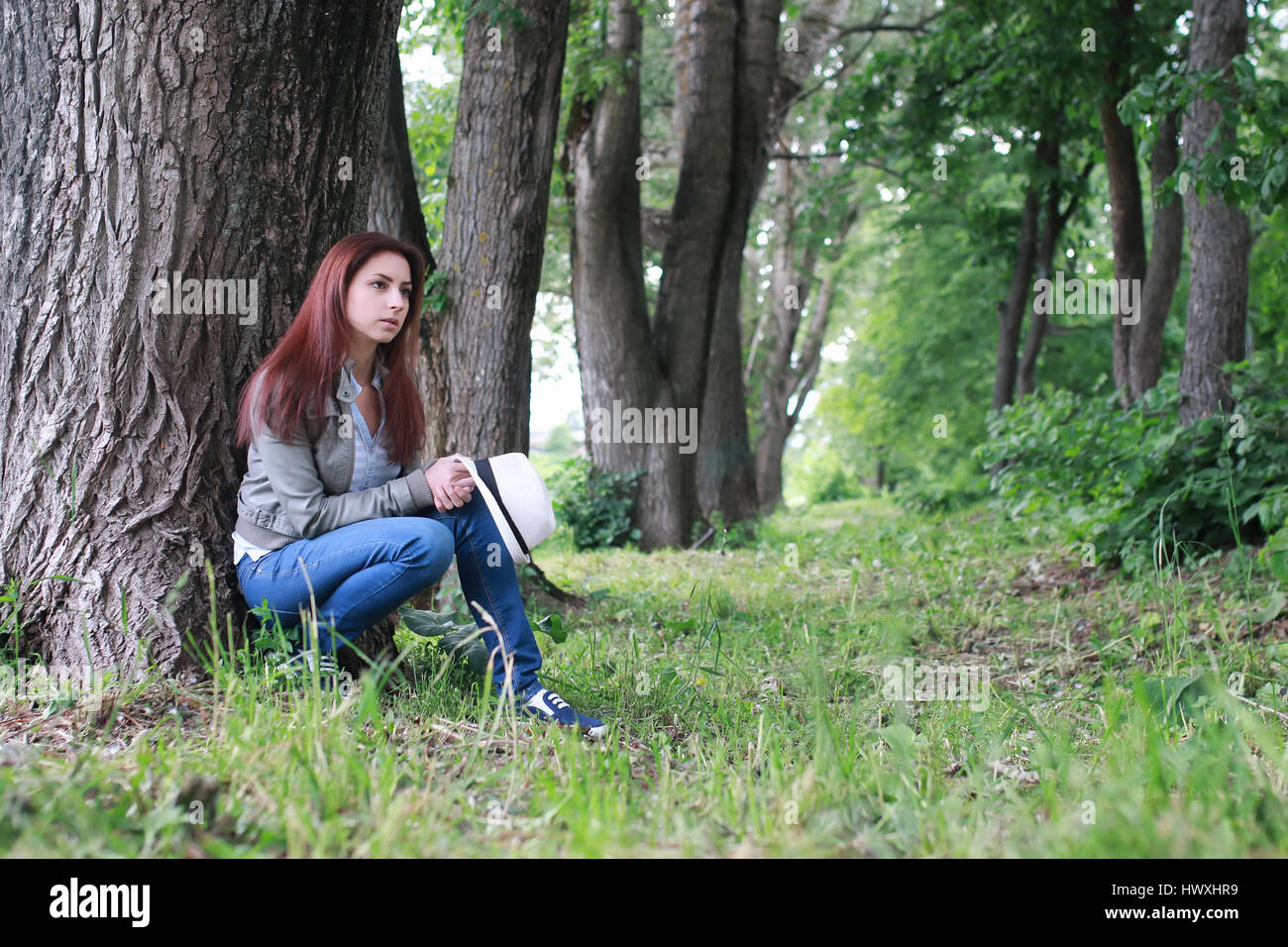 woman in tree park outdoor Stock Photo - Alamy