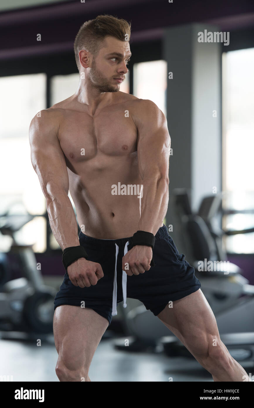 Portrait Of A Young Physically Fit Man Showing His Well Trained Body ...
