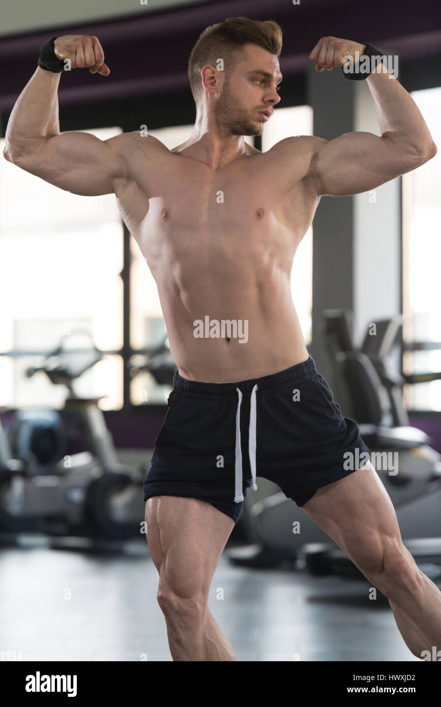 Portrait Of A Young Physically Fit Man Showing His Well Trained Body ...