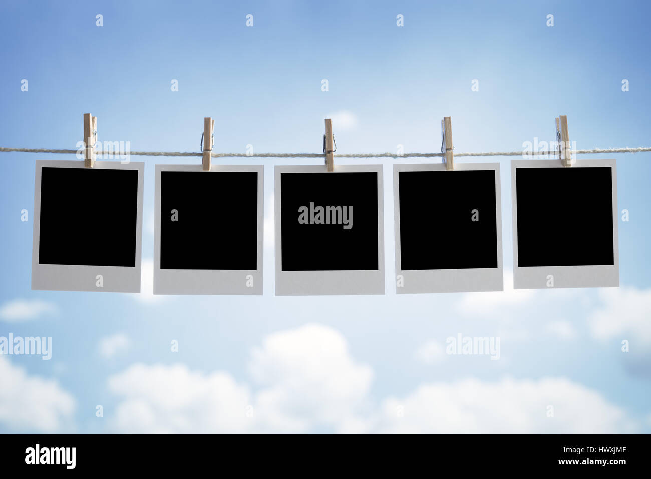 Paper sign on clothesline hi-res stock photography and images - Alamy