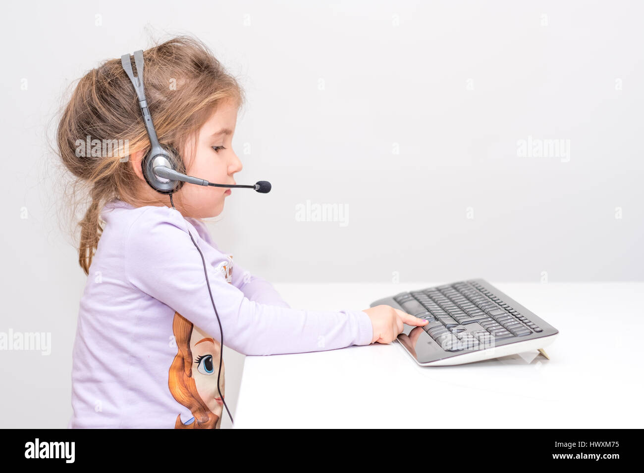 kid girl call center Stock Photo - Alamy