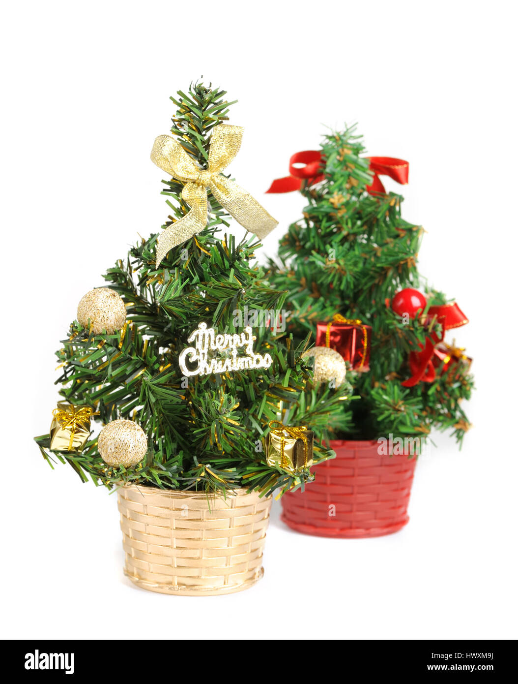 Small christmas tree isolated on white background Stock Photo - Alamy