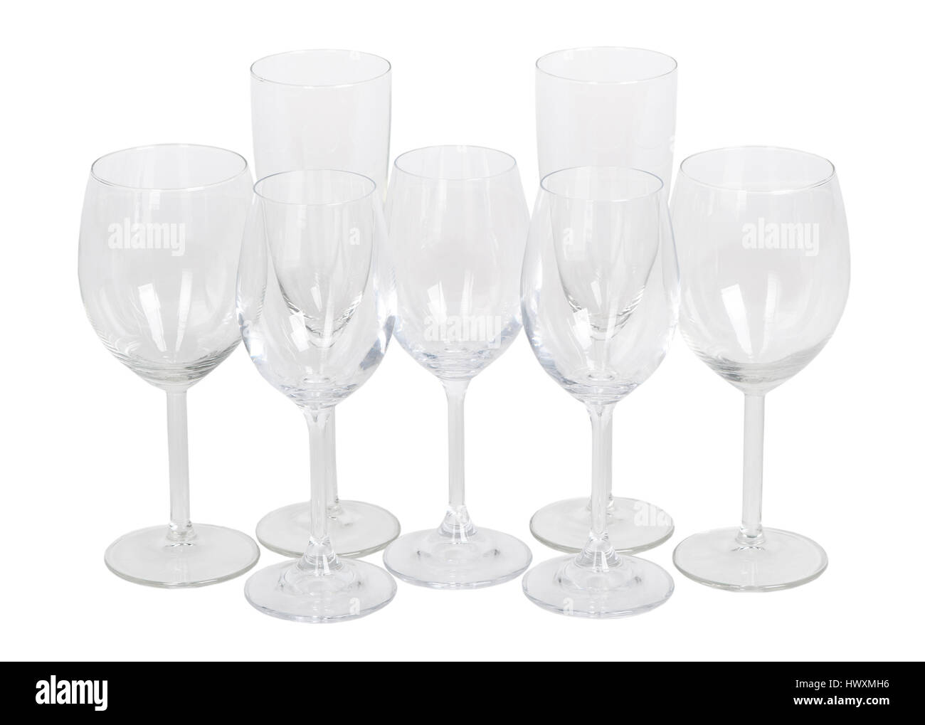 Set of empty wine glasses isolated on white Stock Photo - Alamy
