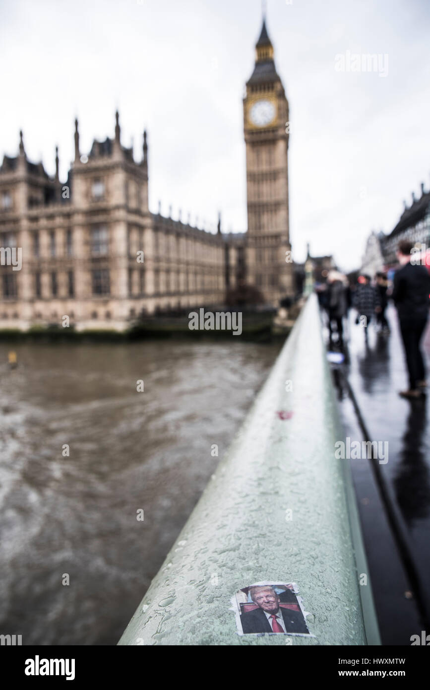 A picture piece of trump sticking on the bridge in front of the palace ...