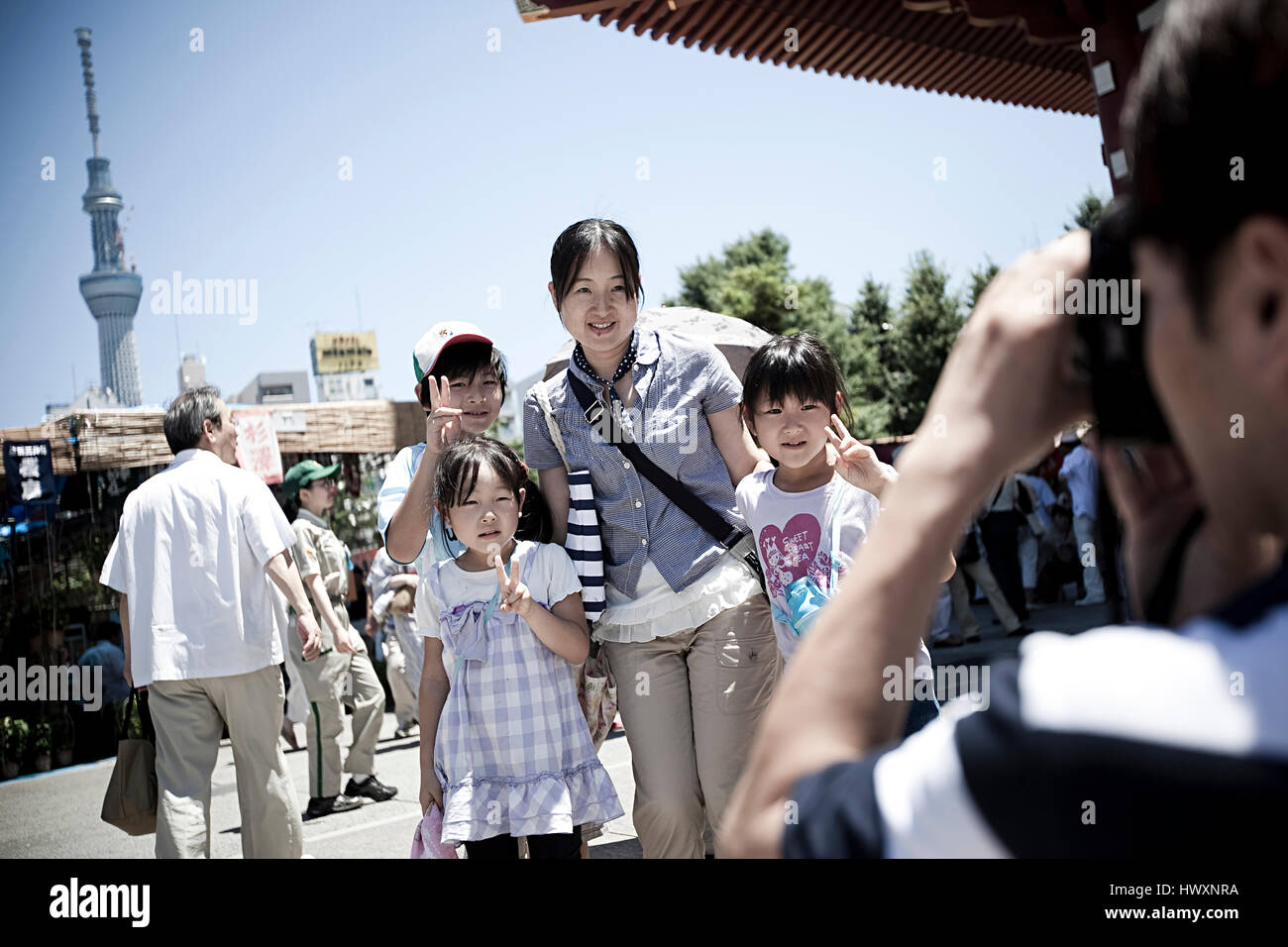 Japanese father taking a picture of his family, Japan Stock Photo - Alamy