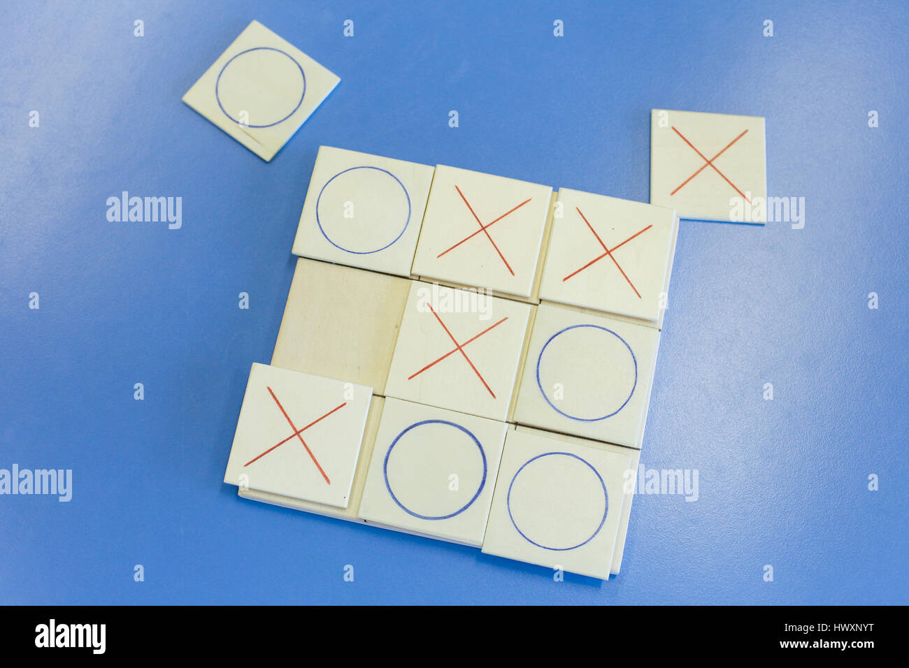 Do-it-yourself educational wooden colorful tic-tac-toe game. Learning ...