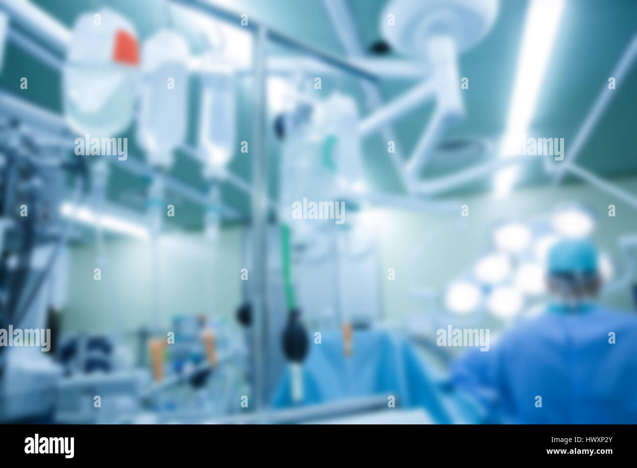 Abstract blurry medical background with IV bags and bottles hanging ...