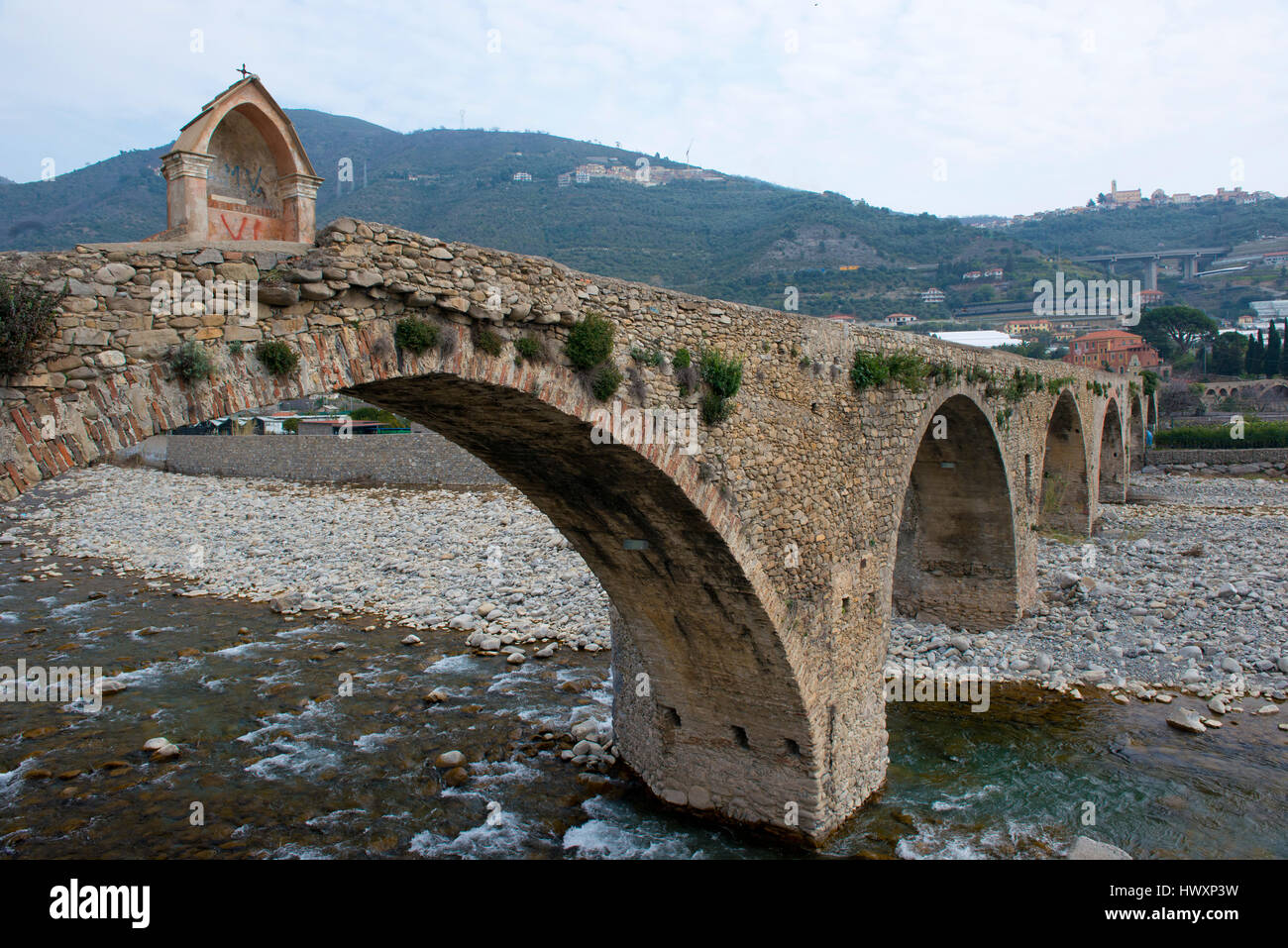 The ancient roman stone bridge on the Argentina river, in Taggia ...