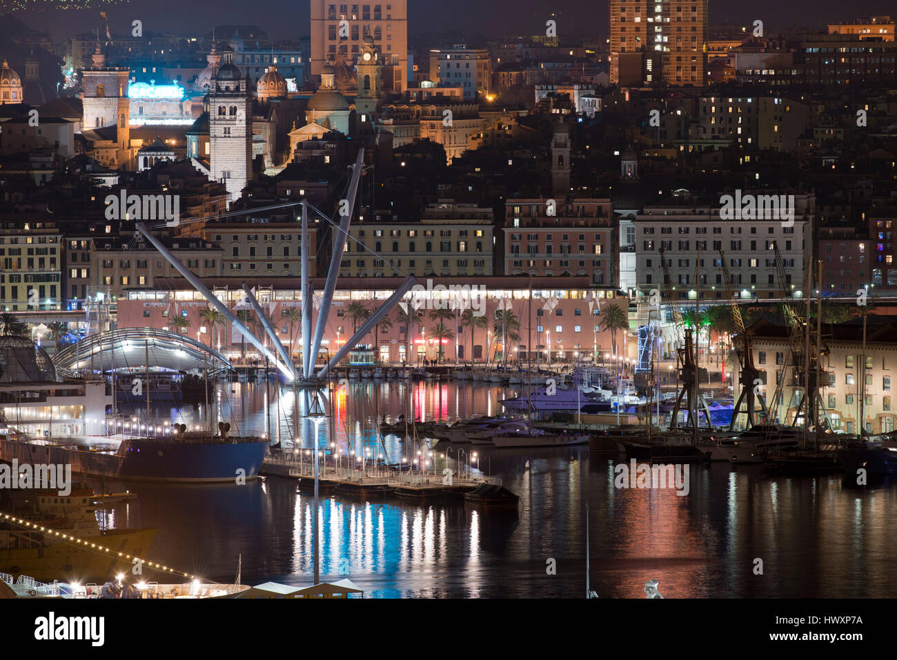 View of the harbour of Genoa illuminated by night Stock Photo - Alamy