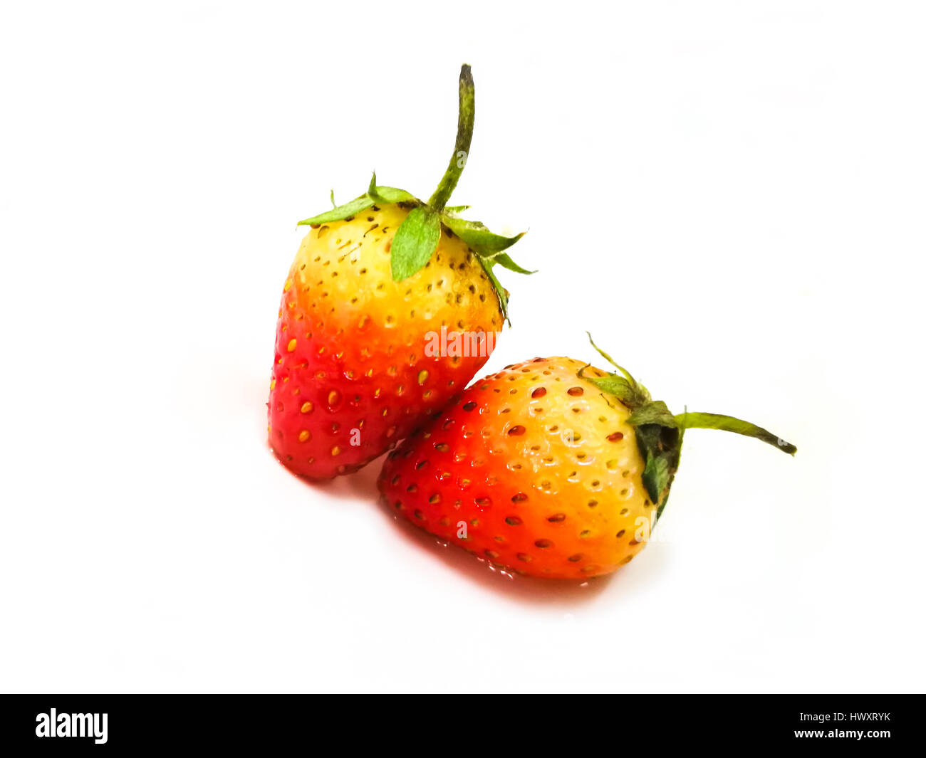 The strawberry is sour on white background Stock Photo - Alamy