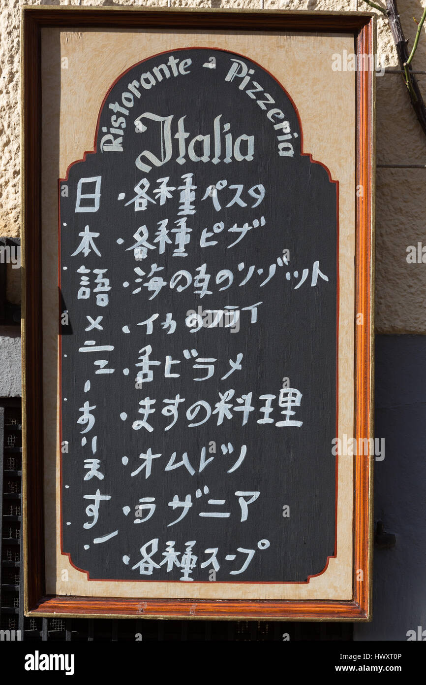 Menu outside Italian restaurant written to attract Chinese tourists in ...