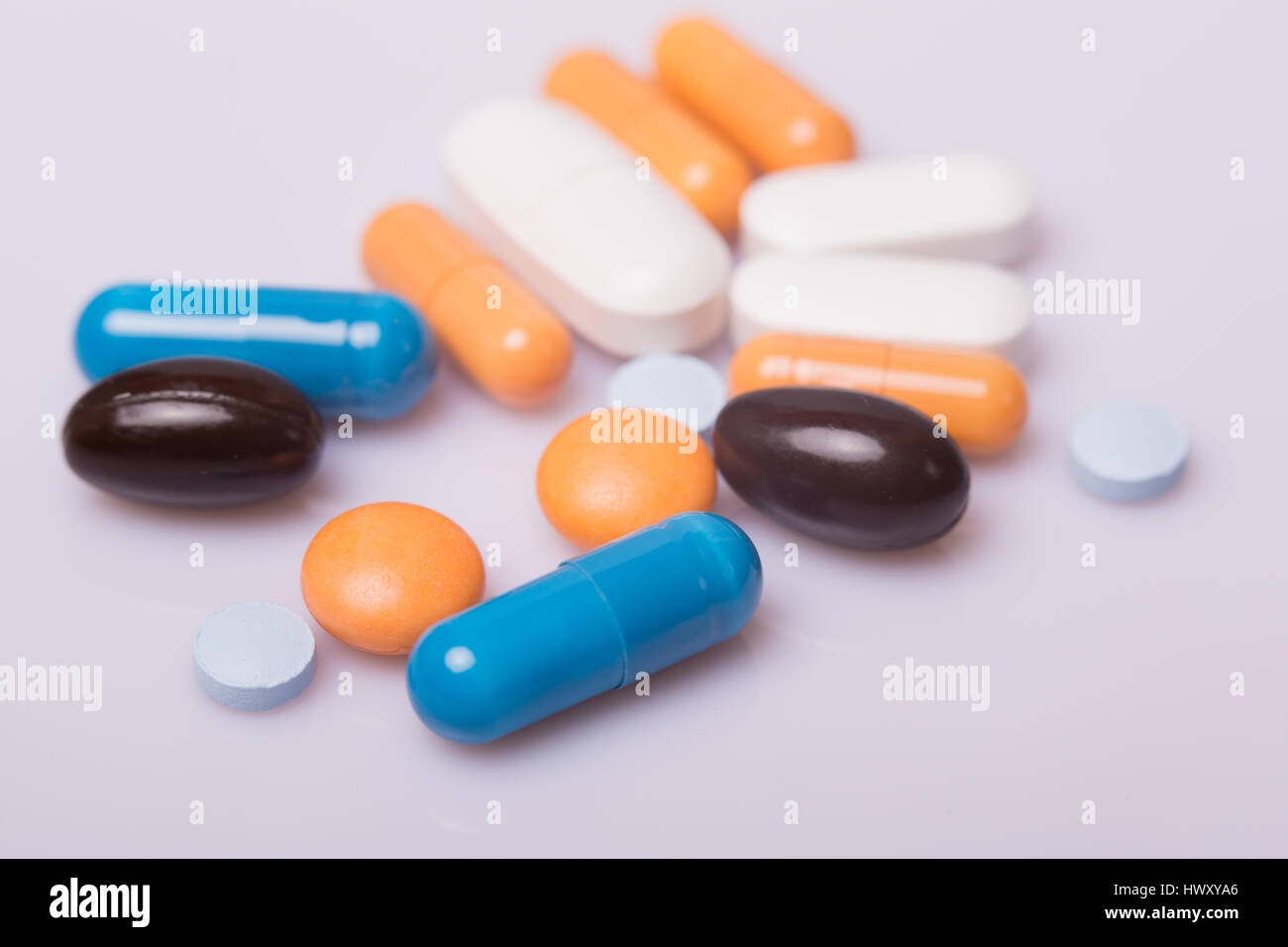 different Tablets pills capsule heap mix therapy drugs Stock Photo - Alamy