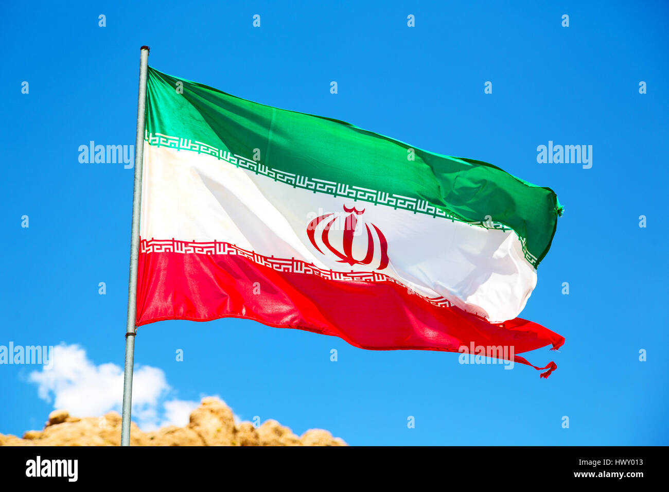 in iran blur iranian waving flag the blue sky and wind Stock Photo - Alamy