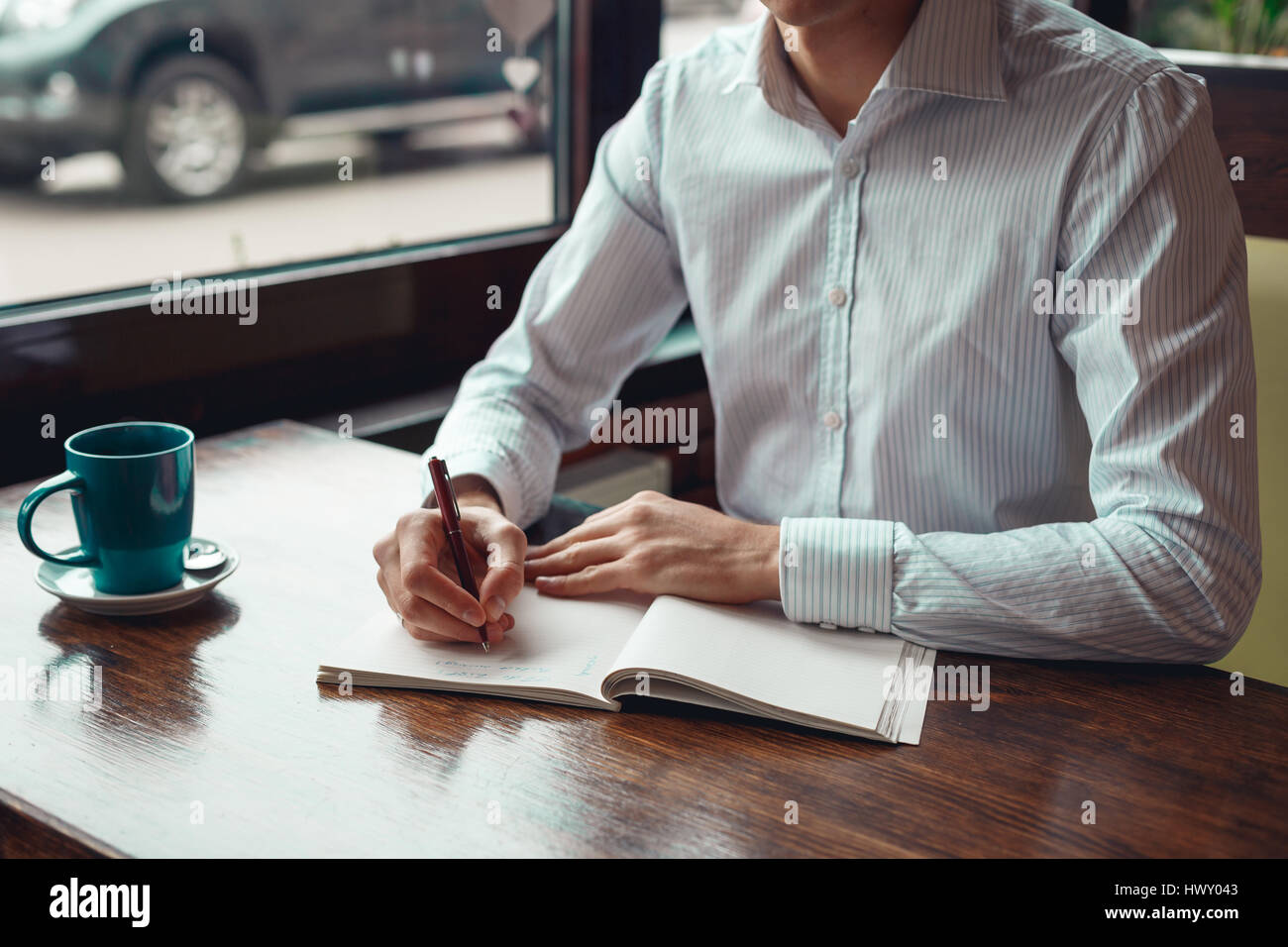 Full concentration man with coffee Stock Photo - Alamy