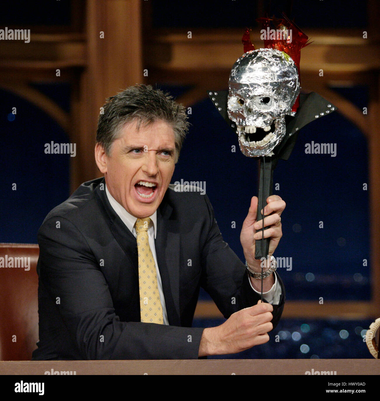 Host Craig Ferguson holds a flaming skull up during a segment of the ...