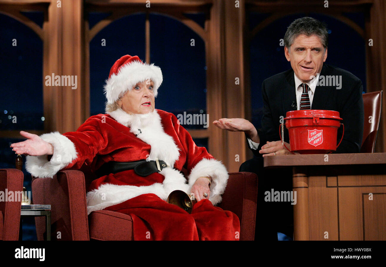 Betty White in a Santa Claus suit with host Craig Ferguson during a ...