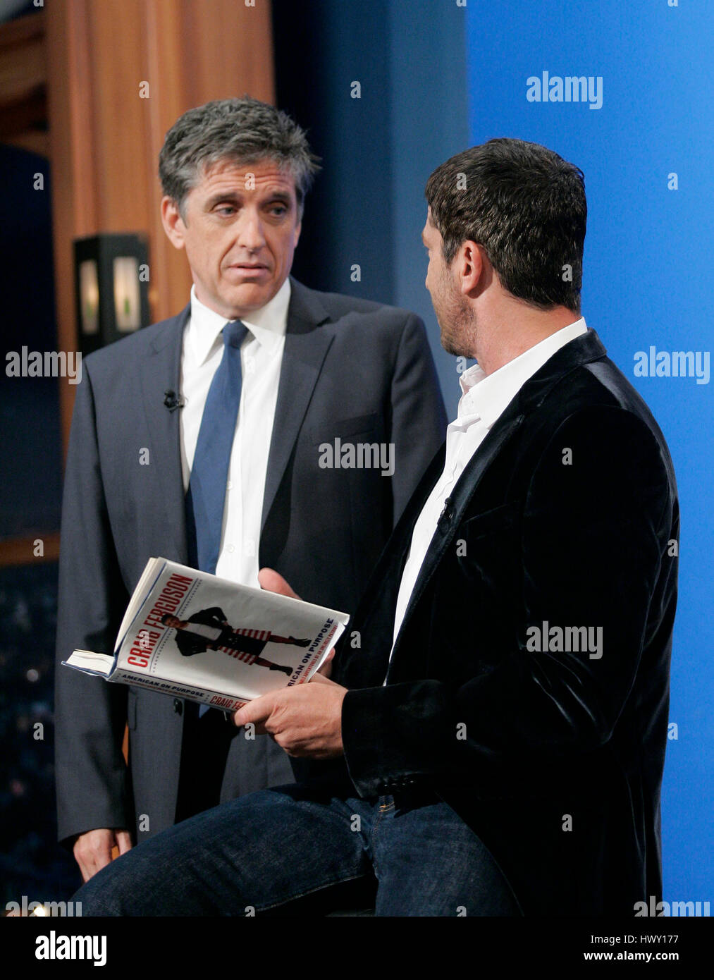 Actor Gerard Butler, right, reads an excerpt from Craig Ferguson's book ...