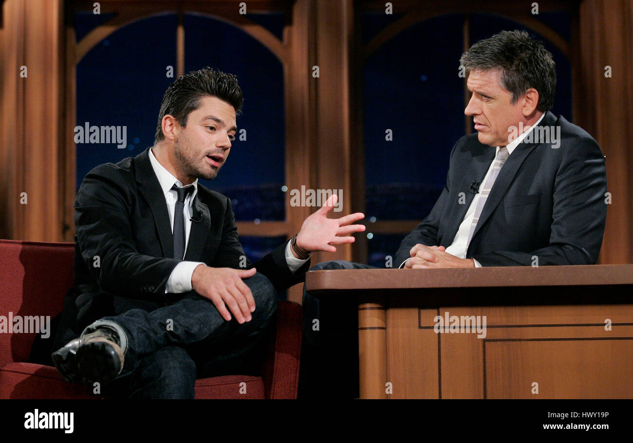 Actor Dominic Cooper, left, chats with host Craig Ferguson during a ...