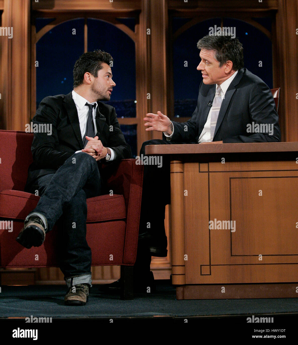 Actor Dominic Cooper, left, chats with host Craig Ferguson during a ...