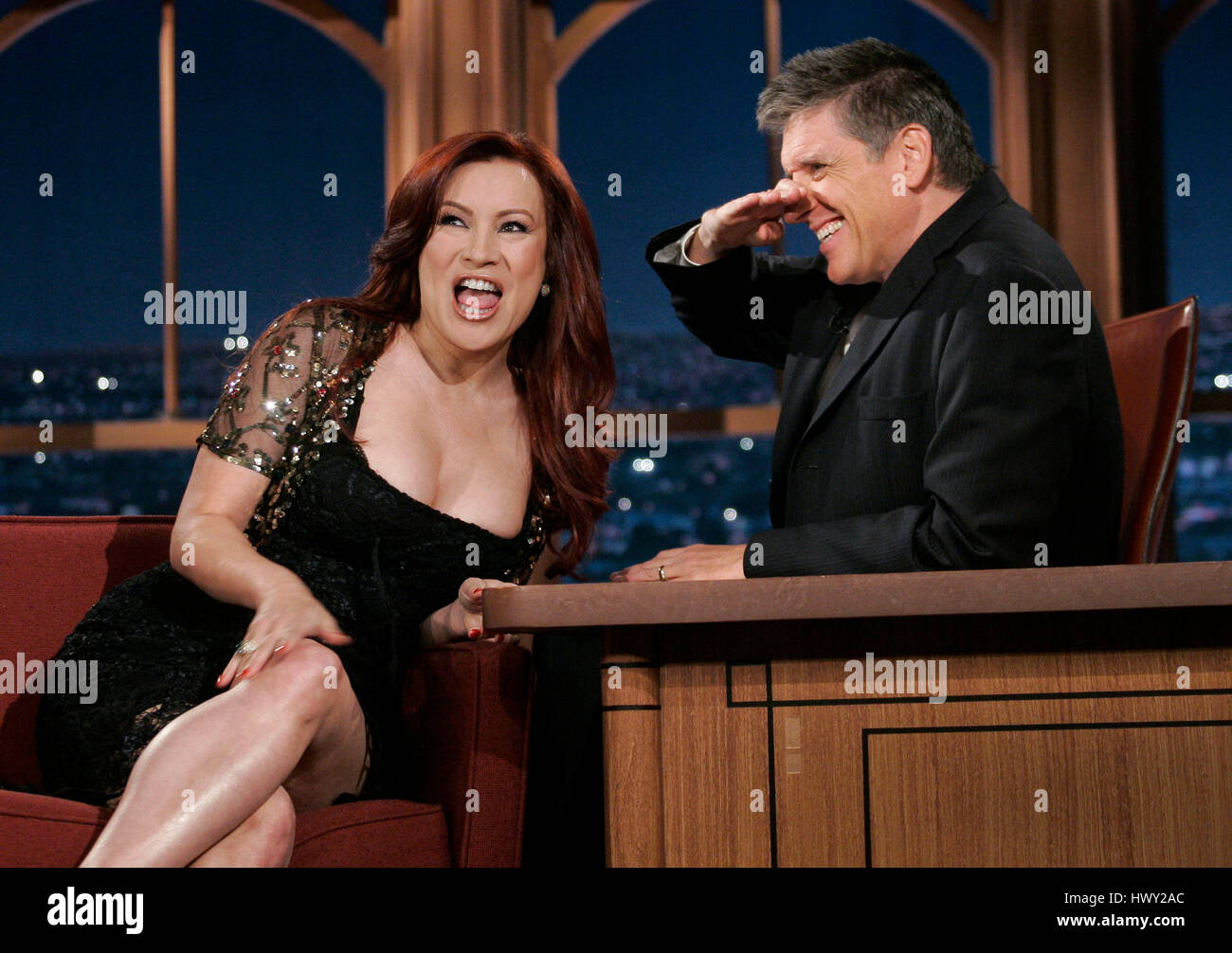 Actress Jennifer Tilly, left, chats with host Craig Ferguson as he ...